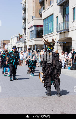 'Border' Morris dancers performing on Harbourside, Lynmouth, Devon ...