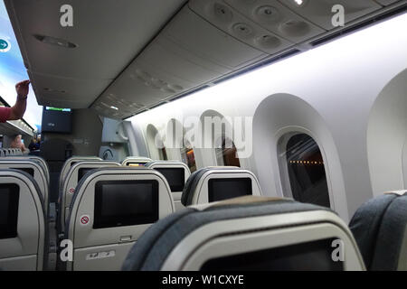 Royal Brunei Airlines Interior flight seating Stock Photo - Alamy