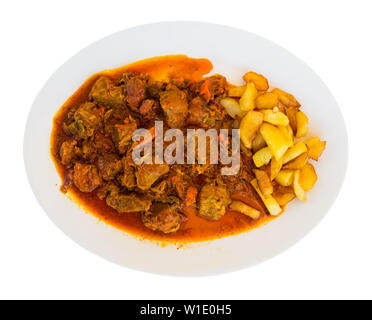 Braised pork cheeks with gravy Stock Photo - Alamy