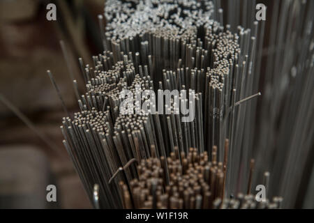 group of metal rods inside container. close-up Stock Photo - Alamy