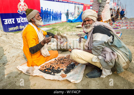 Indian men smoking hashish, Allahabad Kumbh Mela, World’s largest ...