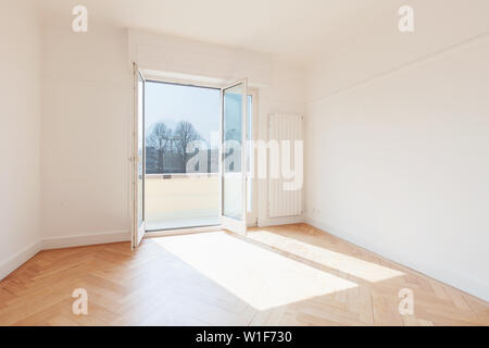 Large room with a terrace or balcony as a construction site when ...