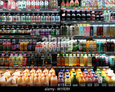 Juices and other beverages in a cooler in a grocery store in New York ...