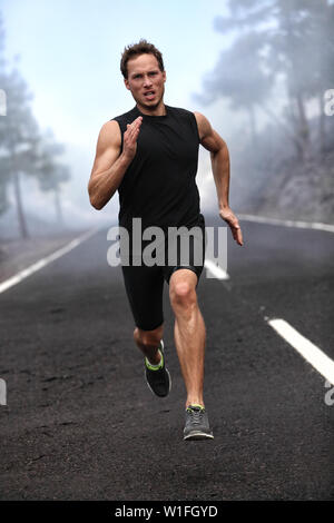 fast man runner on country lane Stock Photo - Alamy