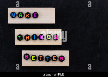 Make things better - Improvement Concept. Black background Stock Photo ...