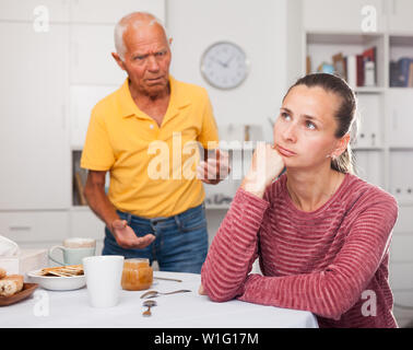 Mature father scolds adult daughter Stock Photo - Alamy