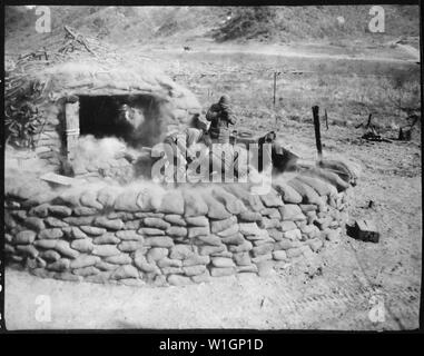 Men of the 4.2 mortar crew, 31st Heavy Mortar Co. fire at enemy ...