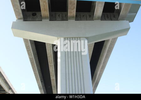 Bridge concrete supports under contemporary concrete bridge Stock Photo ...