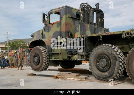U.S. Marine Corps Cpl. Karina Contreras, a motor vehicle operator, with ...