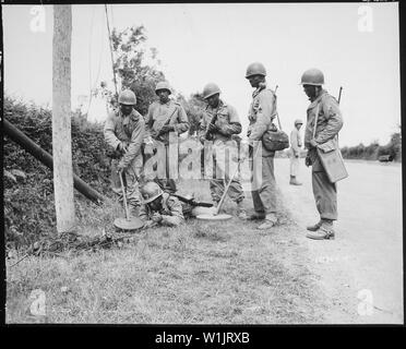 This mine detector crew is demonstrating what they do before going to ...