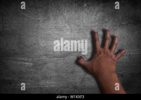 Hand of Darkness cracked black background Stock Photo - Alamy