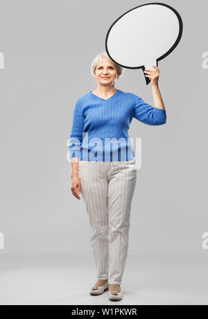 old elder woman holding balloon. asian elderly female relaxing outdoors ...