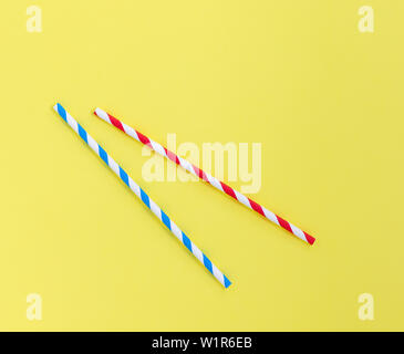 A yellow, blue, and red paper background, the colors of the flags of ...