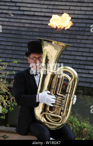 Fire Tuba player The Southbank, London, England Stock Photo - Alamy