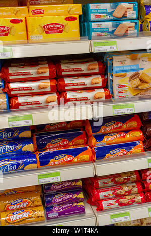 Packets of biscuits on a Co-op supermarket's shelves Stock Photo - Alamy