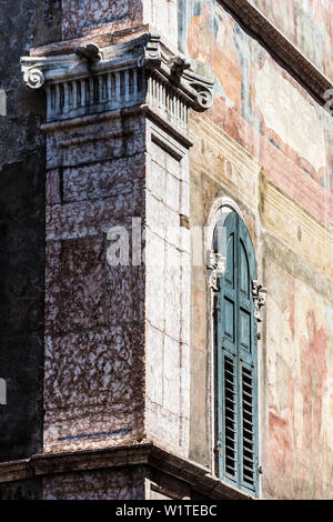 An old house with weather-beaten facade in the Old Town, Trento ...
