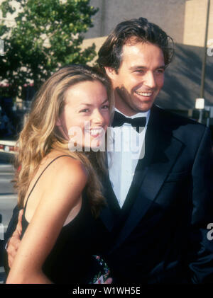 Australian actors Cameron Daddo (R) and Alison Brahe attend the 2014 G ...