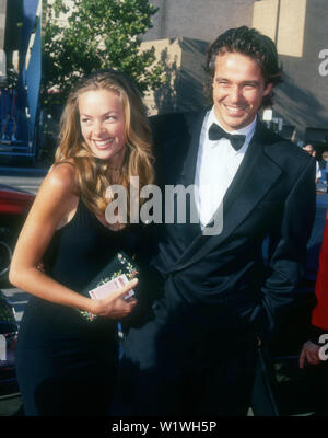 Australian actors Cameron Daddo (R) and Alison Brahe attend the 2014 G ...