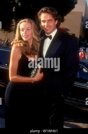 Australian actors Cameron Daddo (R) and Alison Brahe attend the 2014 G ...