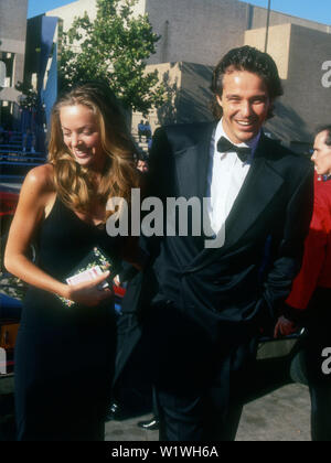 Australian actors Cameron Daddo (R) and Alison Brahe attend the 2014 G ...