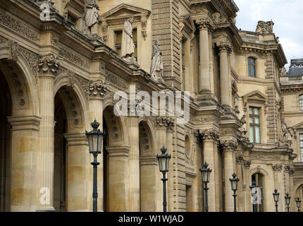 Detail from the facade of the Louvre Museum (Musee du Louvre) in Paris ...