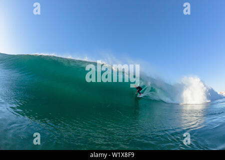 Surfing surfer Michael Dunphy tube rides hollow ocean wave closeup ...