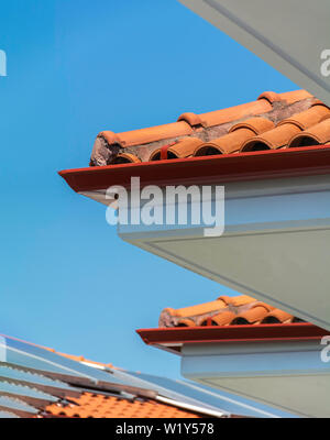 a Closeup shot of a house roof with solar power technologies Stock ...