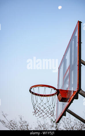 moon in a basketball hoop Stock Photo - Alamy