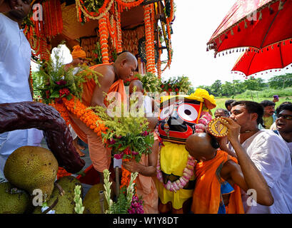 Hindu devotees seen carrying an Idol of Lord Jagannath at Brindaban ...