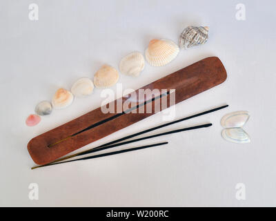 incense stick on a wooden stand Stock Photo - Alamy