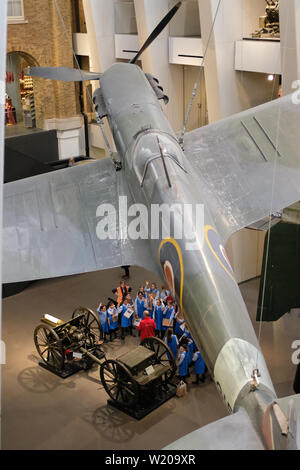 School class gathers below World War II Spitfire to hear about World ...