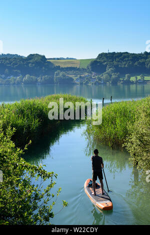 Mattsee: lake Mattsee, ship canal to lake Obertrumer See, motorboat in ...