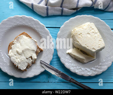 Bowl of fresh creamy clotted cream, known as kaymak, is served with ...