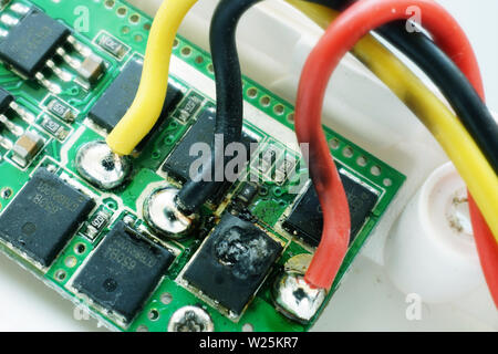 Electricity circuit short burn out overheat chip on the PCB Stock Photo ...