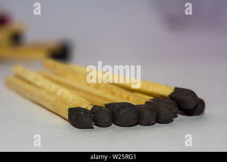 Matches sticks stack together in white background Stock Photo - Alamy