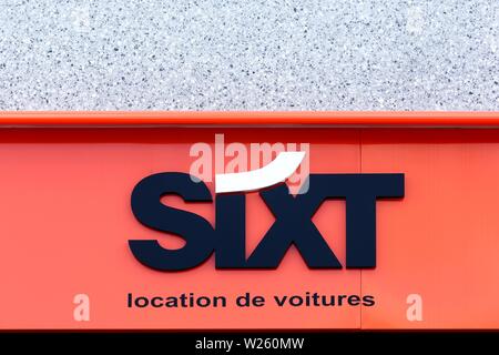 Sixt company logo at the car rental desk of Sixt AG at Munich Stock ...