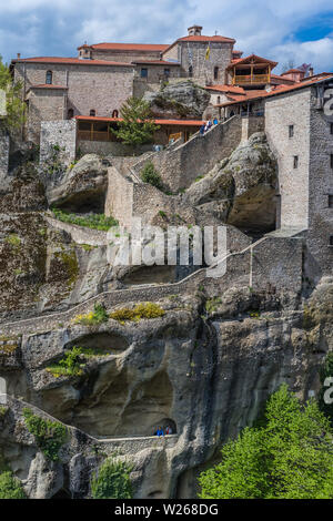 People climbing stairs to Great Meteoron Stock Photo - Alamy