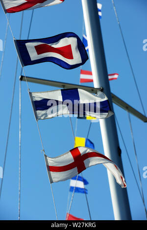 fashion - yellow sign with blue sky background Stock Photo - Alamy