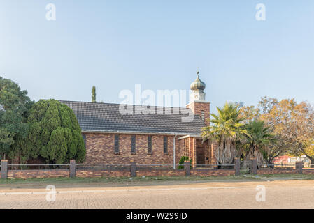 VREDE, SOUTH AFRICA - MAY 1, 2019: A street scene, with businesses and ...