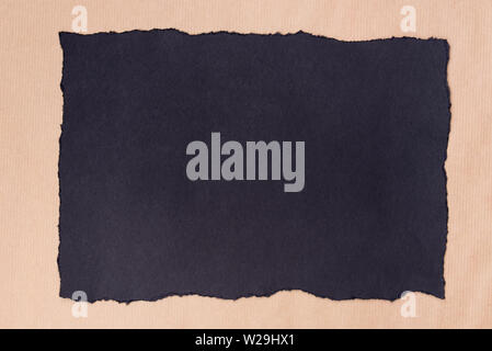 Color torn paper on black background Stock Photo - Alamy