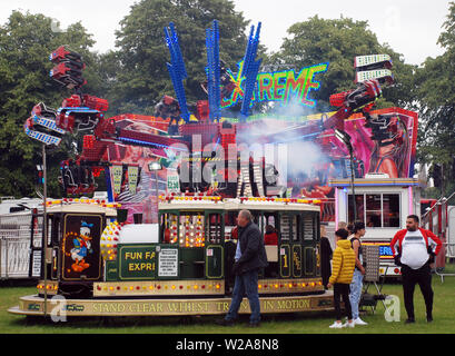 Childrens funfair roundabout in the town centre of Loughborough ...