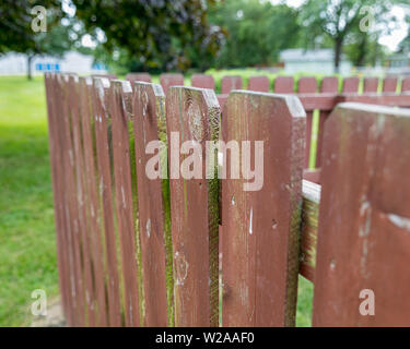 Algae on fence-posts in Swiss Alps Stock Photo - Alamy