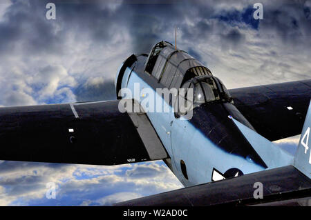 Grumman TBM Avenger flying at an airshow with bomb bay open revealing ...
