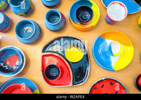 Different tableware on wooden background Stock Photo - Alamy