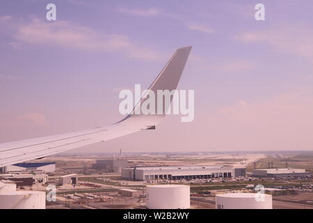 A right wing of Boeing 737-800 jet plane during flight on high altitude ...