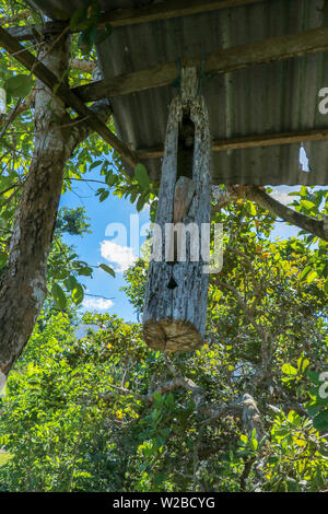 Wooden bell with a mallet made from a tree trunk. Bale Kulkul is ...