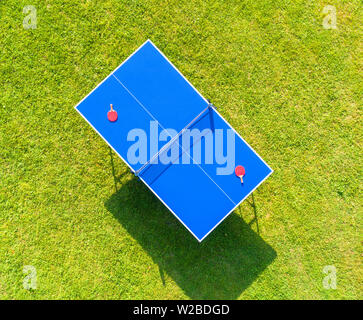 Close up view of two tennis rackets and balls on the clay tennis court ...