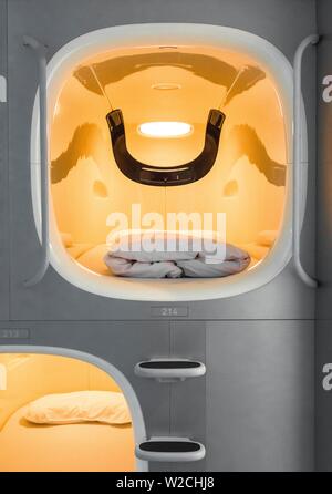 Sleeping capsules in 9hours Hotel, capsule hotel, Tokyo, Japan Stock ...