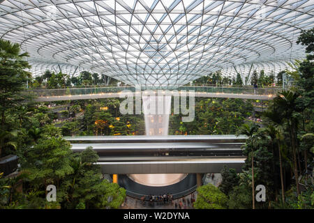 Landscape greenery interior view of Jewel Changi Airport with blue sky ...
