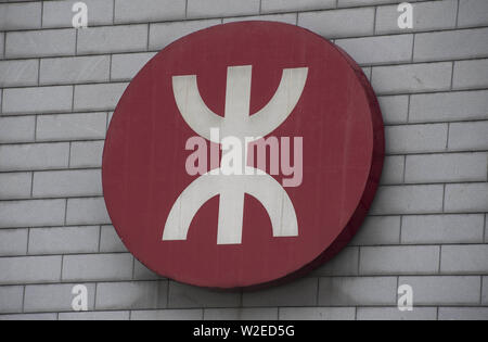Entrance to the subway with MTR logo sign and the Exchange Square ...